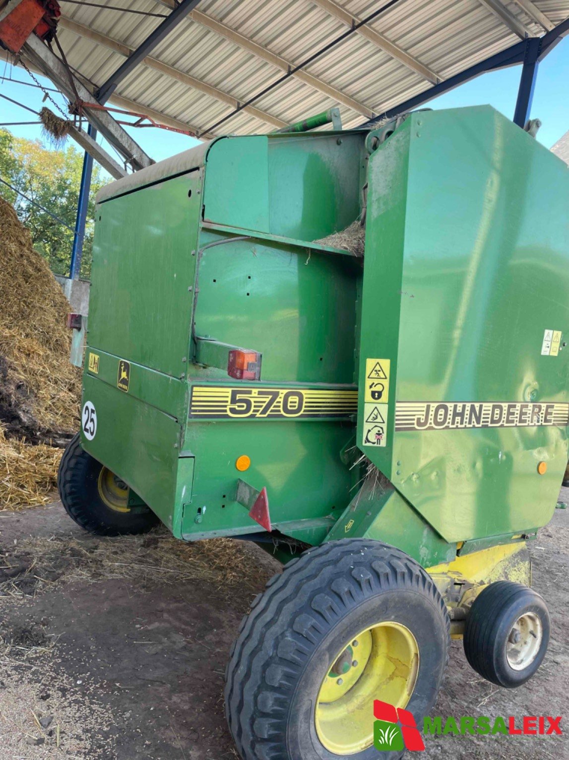 Presse à balles rondes John Deere 570 d'occasion en vente sur Marsaleix